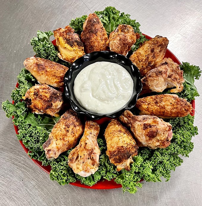 These wings aren't flying anywhere except straight to your plate. Arranged in a perfect circle like a delicious game of chicken roulette.