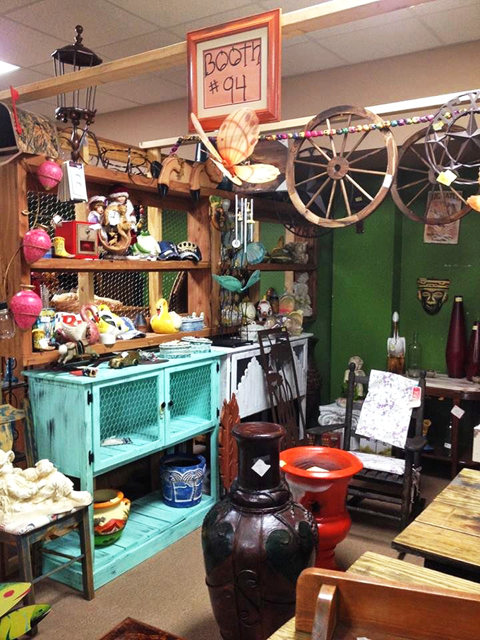 Booth #94 showcases the beautiful chaos of antiquing—where wagon wheels and ceramic chickens become must-have décor.