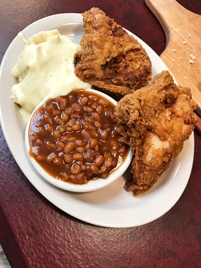 Baked beans and fried chicken flanking those famous mashed potatoes&mdash;a holy trinity of heartland cuisine that would make any homesick Kansan weep with joy.