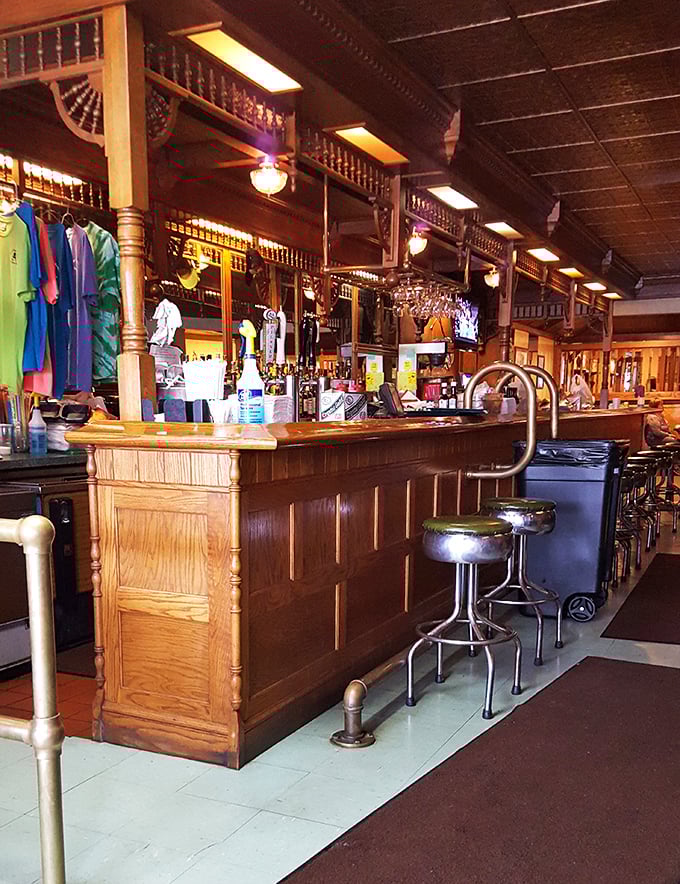 The bar area feels like a community living room where strangers become friends over shared appreciation for properly cooked protein.