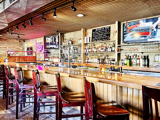 The bar where liquid courage flows freely. Many a sailing tale has grown taller with each round ordered at this wooden sanctuary.