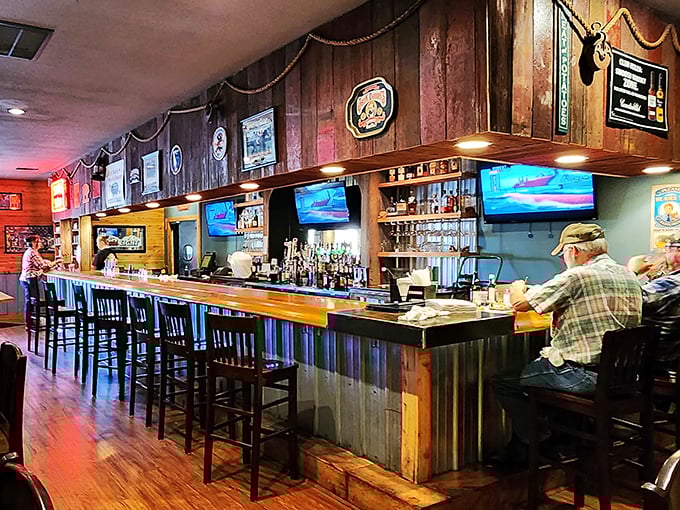 The bar at Squealer's &ndash; where strangers become friends and friends become family over cold drinks and barbecue debates.