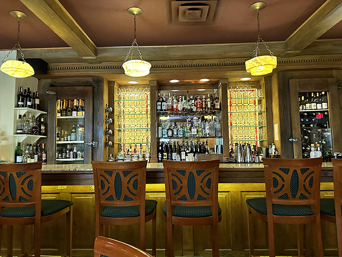 The bar beckons with amber lighting and comfortable seating &ndash; a sanctuary where wine decisions are the only stress allowed.