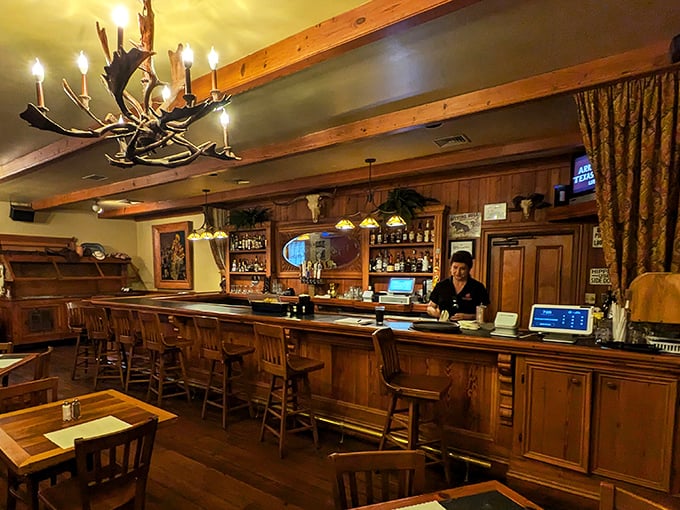 The bar isn't just serving drinks&mdash;it's dispensing liquid happiness. Those wooden barstools have supported generations of satisfied diners.