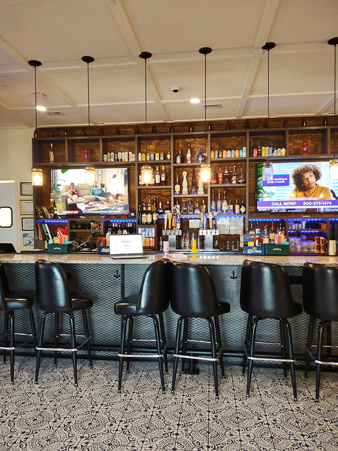 The well-stocked bar promises liquid encouragement for those hesitant about trying raw oysters for the first time.