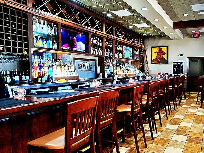 A bar that means business. Those bottles aren't decoration&mdash;they're possibilities waiting to complement your perfectly aged steak.