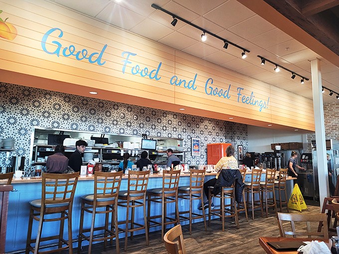 "Good Food and Good Feelings" isn't just wall art - it's the promise delivered with every plate that leaves this bustling kitchen.