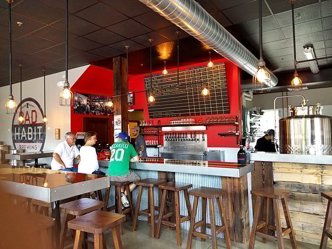 The beating heart of Bad Habit&mdash;where brewing science meets Midwestern hospitality. That red accent wall adds just the right amount of drama.