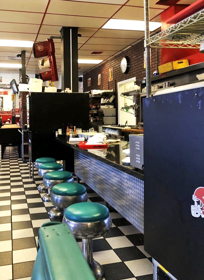 Counter seats: where breakfast becomes theater. Watch short-order magic happen while perched on those mint-green stools that have supported generations of hungry Arkansans.