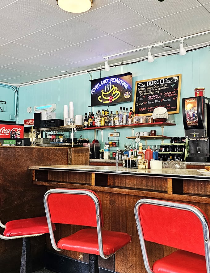 The command center of breakfast operations&mdash;where coffee flows freely and red vinyl stools have witnessed countless "I'll just have one more bite" moments.