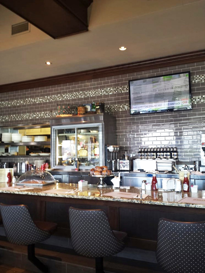 The counter where magic happens&mdash;gleaming subway tile and the promise of desserts that make grown adults giggle with anticipation.