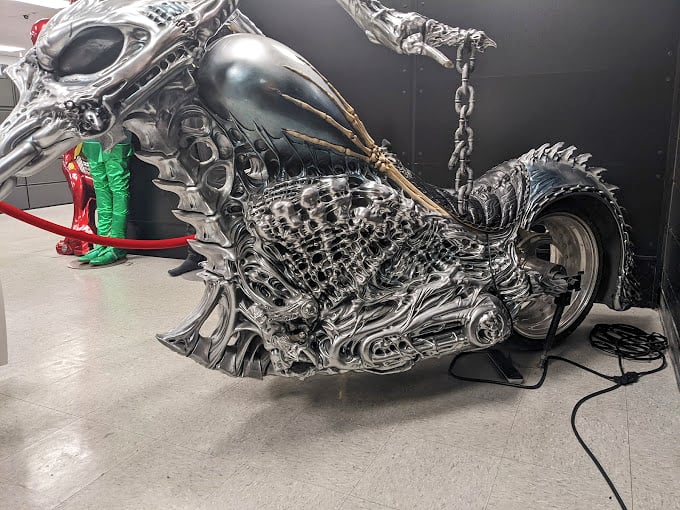 Ghost Rider's motorcycle looks ready to burn rubber - literally. This fiendish chopper brings the spirit of vengeance to life with its skull-crushing design and otherworldly presence.