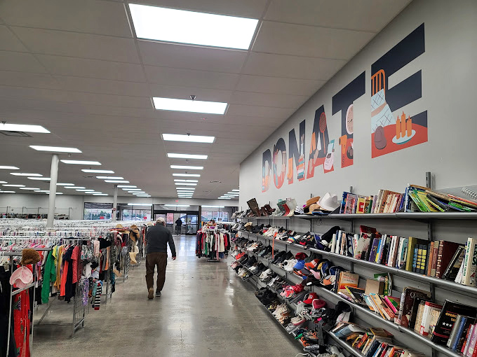 Under the bold "DONATE" sign, books and media await new homes, proving that both stories and generosity have remarkable staying power.