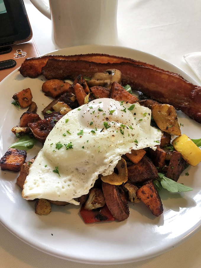 Breakfast that puts your usual granola bar to shame&mdash;a symphony of roasted vegetables crowned with a perfectly fried egg and bacon that means business. 