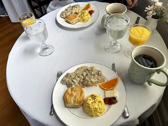 Southern breakfast done right&mdash;biscuits, eggs, and what looks like heavenly gravy. Coffee and juice complete this morning masterpiece that puts hotel continental breakfasts to shame.
