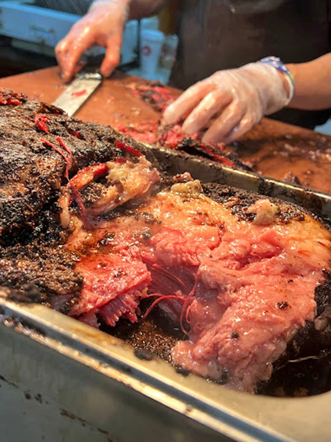 The brisket reveals itself in all its glory, tender enough to surrender at first bite. This isn't just meat&mdash;it's a testament to patience and tradition.