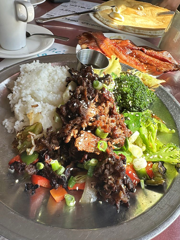 A Korean feast hiding in a breakfast joint: tender bulgogi, steamed rice, and fresh vegetables create a colorful cultural conversation on a plate. 