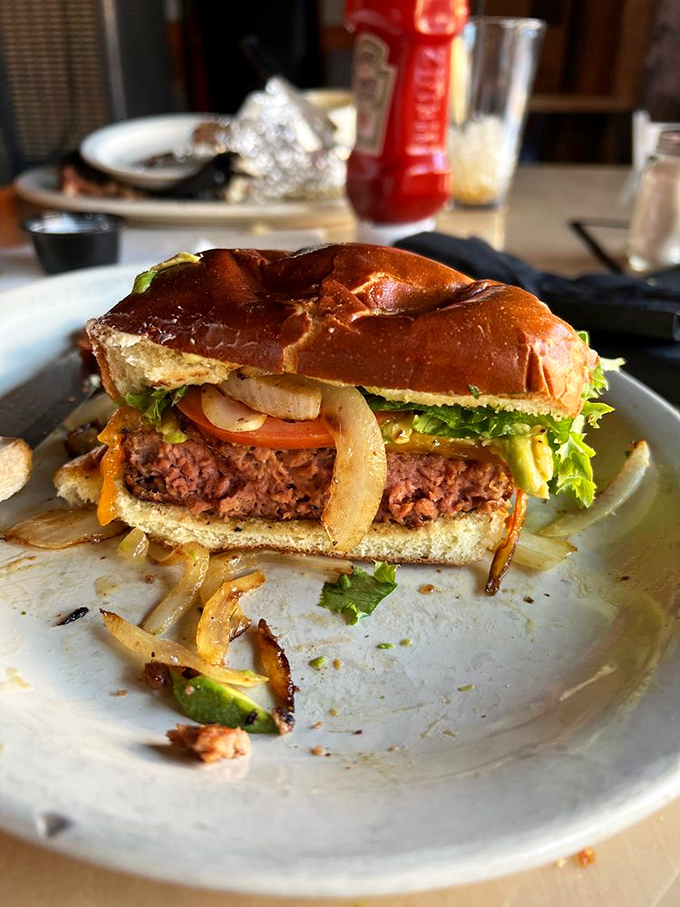 This isn't just a burger&mdash;it's a towering achievement of beef architecture with caramelized onions that deserve their own fan club.