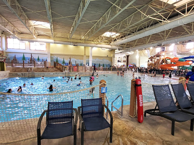 The wave pool's edge&mdash;where lounge chairs become prime real estate and parents perfect the art of simultaneous relaxation and lifeguarding.