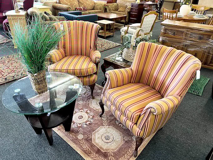 These striped armchairs look like they've hosted many heart-to-hearts. Paired with that glass table, they're ready for your next gossip session.