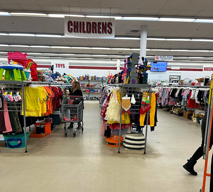 The children's section, where yesterday's birthday outfits await tomorrow's special occasions. Those tiny formal dresses have stories of cake-smeared celebrations to tell.