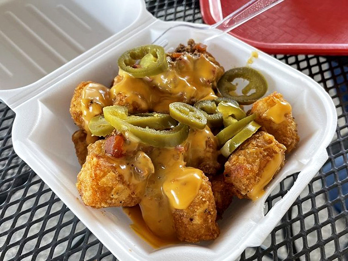 What alchemy transforms humble tater tots into this magnificent creation? Cheese, jalape&ntilde;os, and a kitchen that understands comfort food's soulful magic.