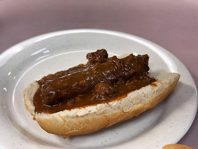 The humble hot dog, elevated to an art form. That chili topping isn't just a condiment&mdash;it's a declaration of delicious intent.