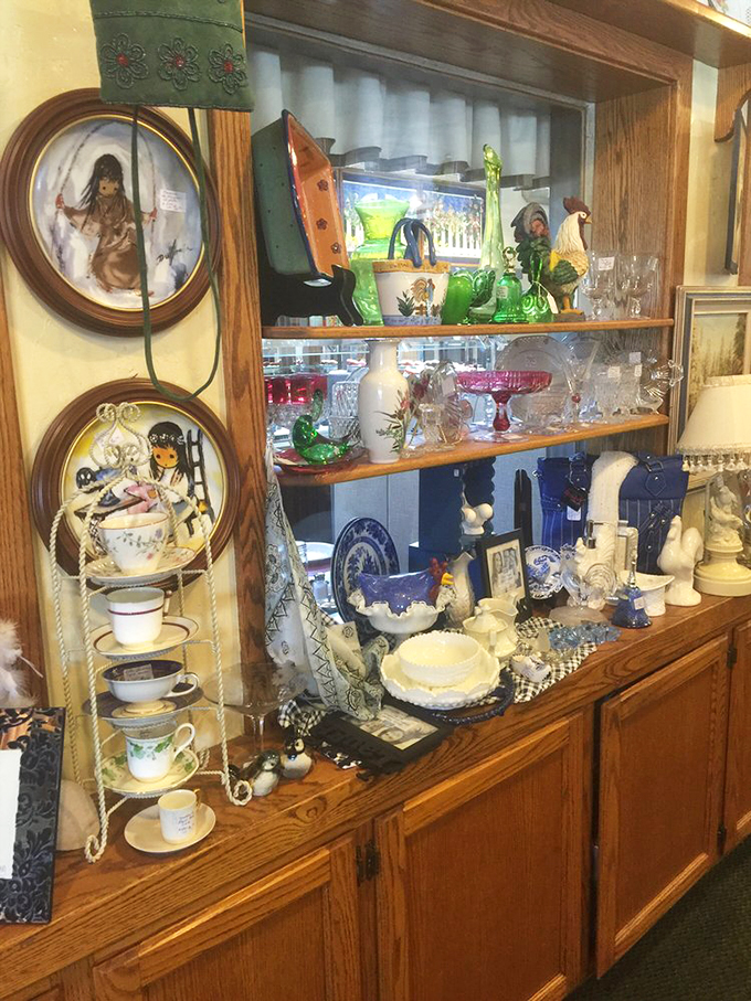 The gift shop's china collection—because nothing says "I enjoyed my meal" like buying a decorative rooster to commemorate the experience.
