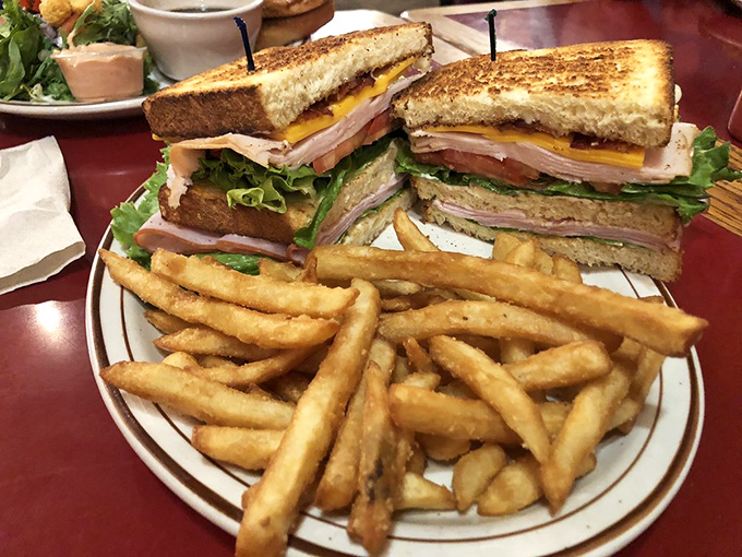 Dining under flying waterfowl isn't just a meal, it's performance art &ndash; the taxidermy air show adds a uniquely Oregon wilderness vibe to your pancakes.