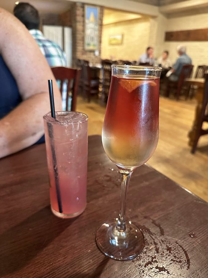 When cocktails look this good, you know you're not at a chain restaurant. That ombr&eacute; effect is pure liquid artistry.