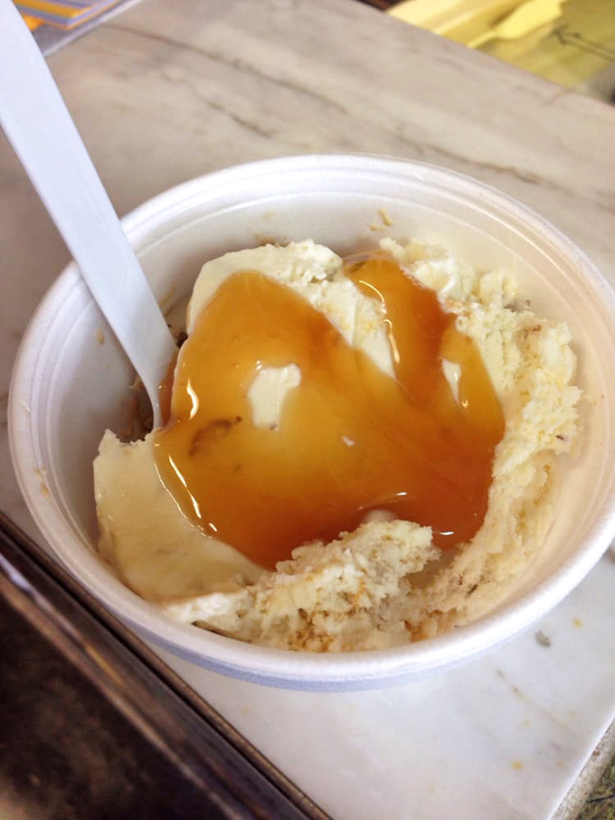 Vanilla ice cream with caramel drizzle that's performing a slow, sensuous dance. Simple yet sophisticated, like the perfect little black dress of desserts.