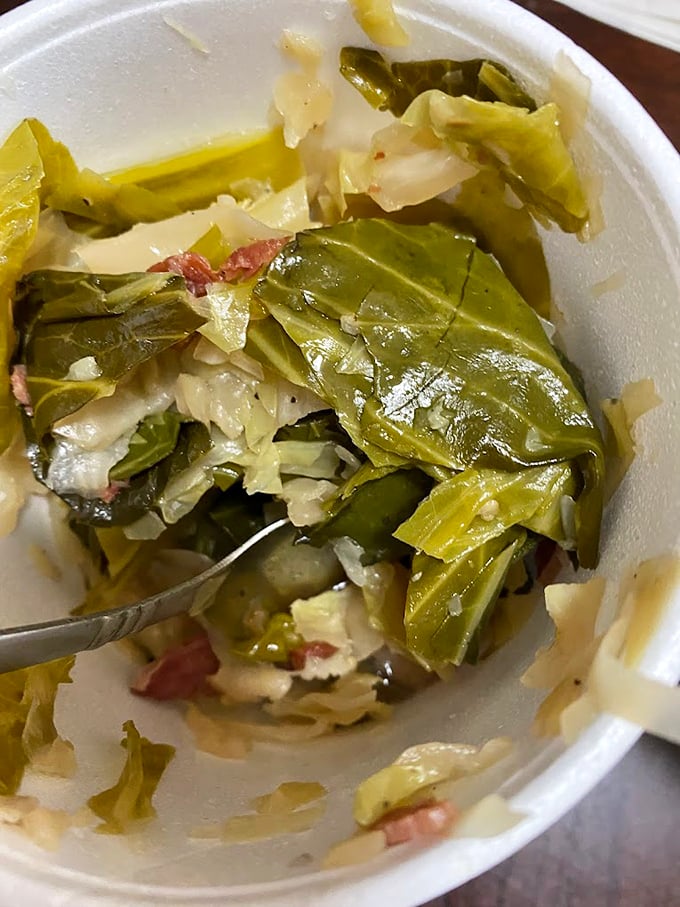 These aren't your cafeteria lady's greens. Tender collards, kissed with smoky pork and pot liquor, tell the story of generations of Southern cooking wisdom.