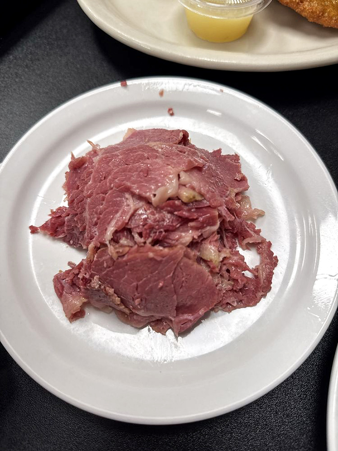 This plate of naked corned beef shows the star without its supporting cast &ndash; tender, pink, and ready for its close-up.