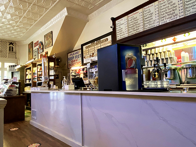 Behind this counter, soda jerks have crafted malts and sundaes since the Titanic sank, mastering the art of comfort in a glass.