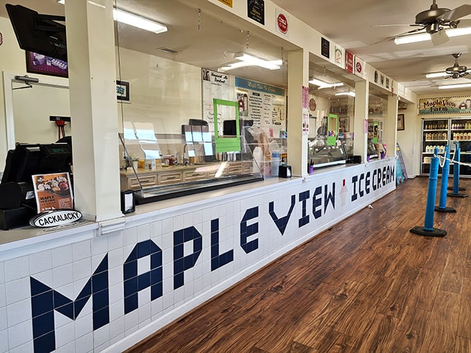 The counter where dreams come true, one scoop at a time. That MAPLE VIEW sign isn't just lettering &ndash; it's a promise.