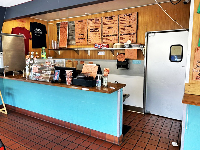 The counter where dreams come true&mdash;a blue-trimmed command center orchestrating Portland's barbecue symphony. 