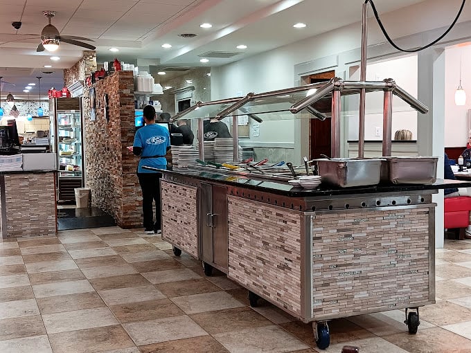 The buffet station stands ready for action, like a NASA launch pad moments before liftoff. Prepare for a journey to flavor country.