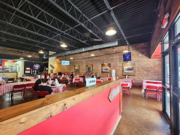 The dining room at Big Tiny's isn't just spacious&mdash;it's designed for the serious business of barbecue appreciation. Those exposed brick walls have absorbed decades of satisfied sighs.