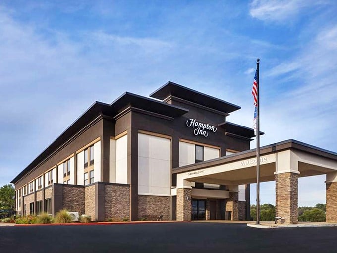 Even the Hampton Inn dresses up for dinner in Natchitoches—because in the oldest town in Louisiana, even chain hotels respect architectural traditions.
