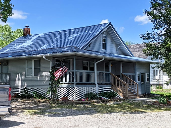 Simple porches and American flags &ndash; this Jamesport inn embodies heartland hospitality where conversations matter more than Wi-Fi passwords.