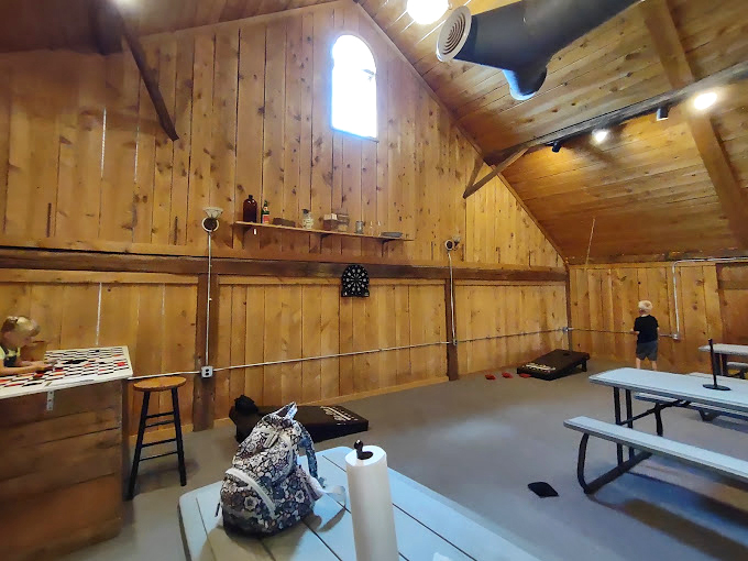 A barn-like interior transformed into barbecue paradise. The wooden cathedral ceiling watches over countless moments of "first-bite bliss." P