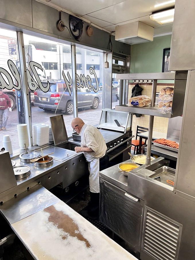 The wizard behind the curtain &ndash; where decades of tradition and skill transform simple ingredients into Detroit's most beloved culinary icon.