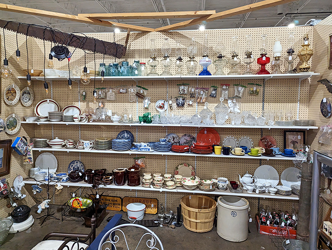 Grandmother's china collection and colorful kitchenware await new homes. These cups have likely served everything from Depression-era coffee to 1970s Tang.
