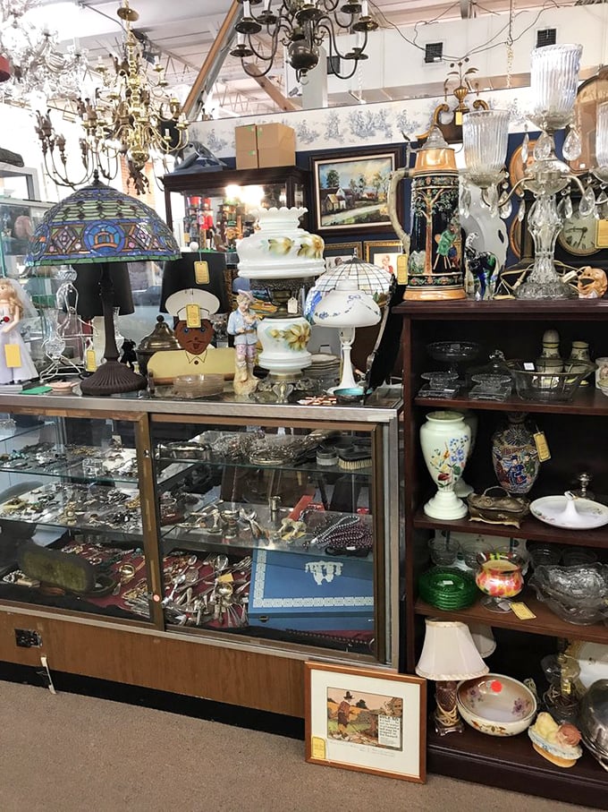 Tiffany-style lamps casting kaleidoscope shadows over display cases of yesterday's treasures. Light fixtures that double as functional art and conversation starters.
