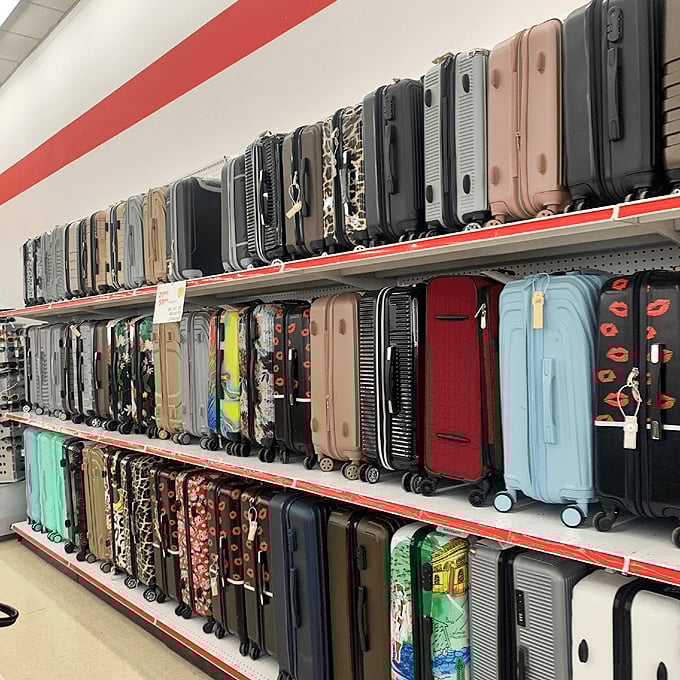 Luggage in every color of the wanderlust rainbow. These suitcases stand ready for adventures both grand and modest.