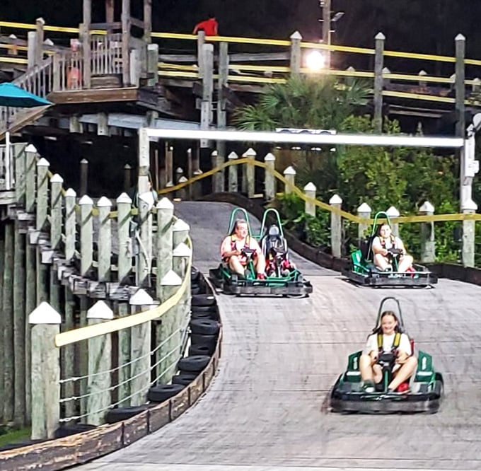 Nighttime racing adds that perfect dash of "should we really be doing this?" excitement. The track transforms into a neon-lit speedway where bedtimes are merely suggestions.