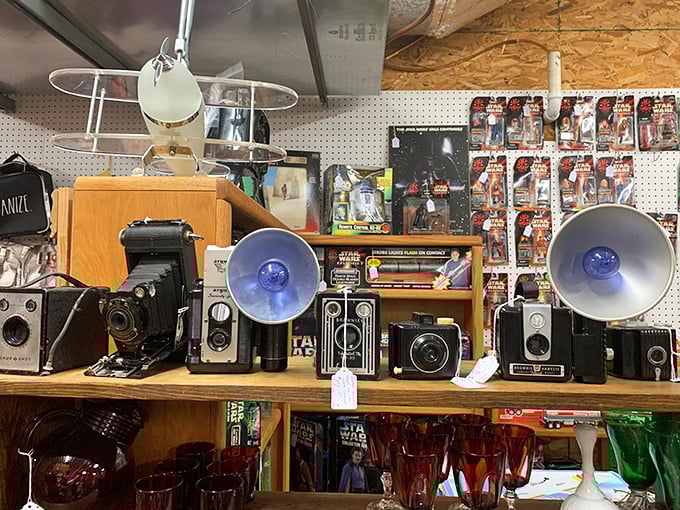 A friendly face greets shoppers at the checkout counter. The best flea markets come with personal connections and genuine smiles. 