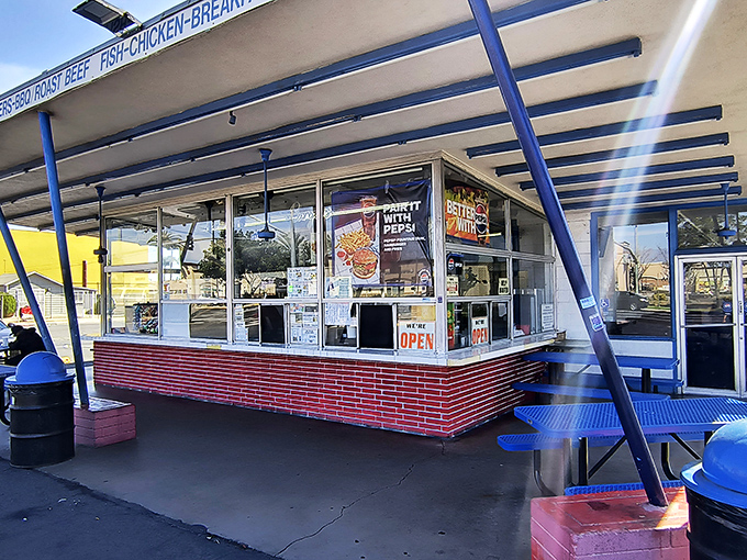 The ordering window at George's&mdash;where dreams come true, calories don't count, and "I'll just have a salad" turns into "Double cheeseburger, please."