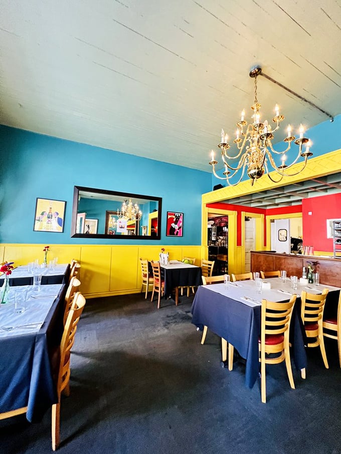 The blue and yellow dining room doesn't whisper "French bistro"&mdash;it belts it out like Edith Piaf with a chandelier for emphasis.