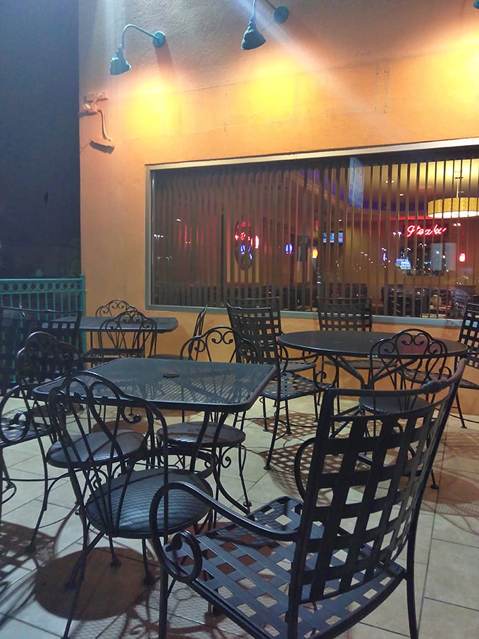 The outdoor patio where sweet tea tastes even sweeter and conversations flow as easily as the refills. Southern hospitality in spatial form.